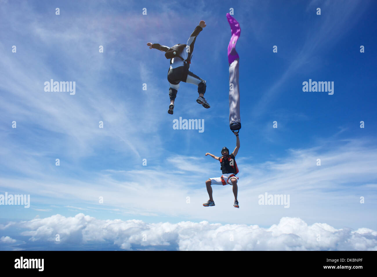 2 skydivers flying an air tube over Diani Beach, Kenya Stock Photo - Alamy