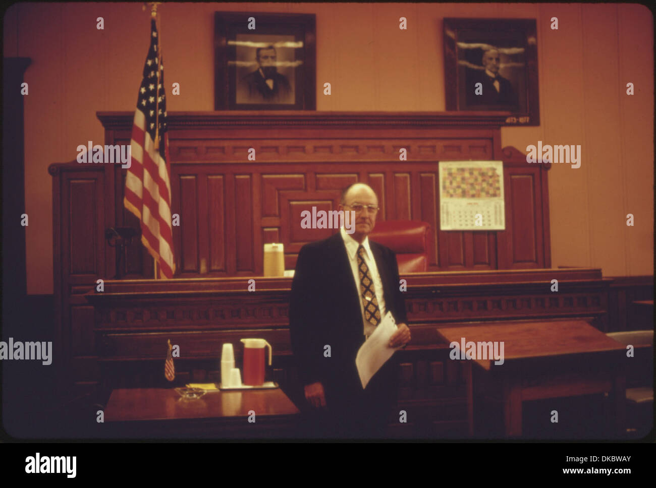 An official stands in the courtroom of the Atchison County Courthouse ...