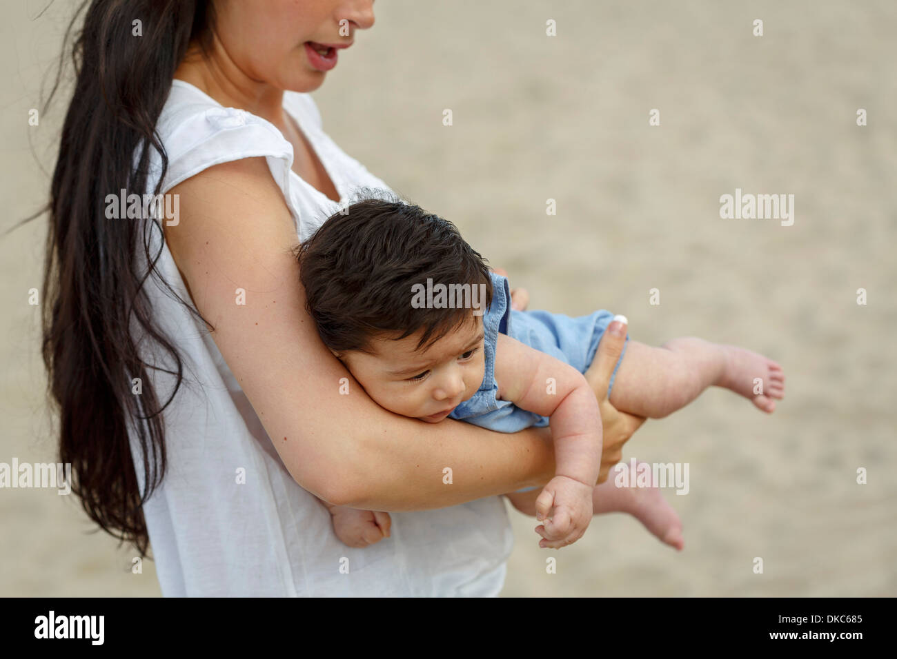 Mother and baby in arms hi-res stock photography and images - Alamy