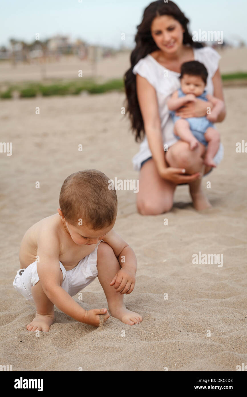Boy digging sand hi-res stock photography and images - Alamy