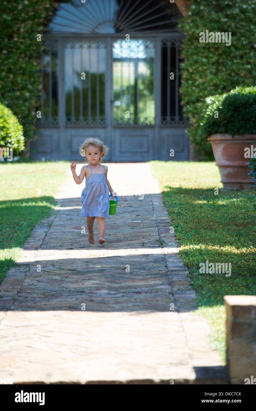 Child Carrying Bucket High Resolution Stock Photography and Images - Alamy