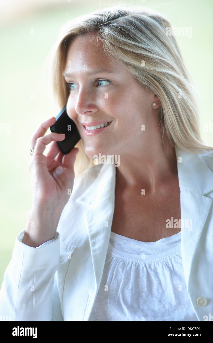 Mature woman on phonecall Stock Photo - Alamy