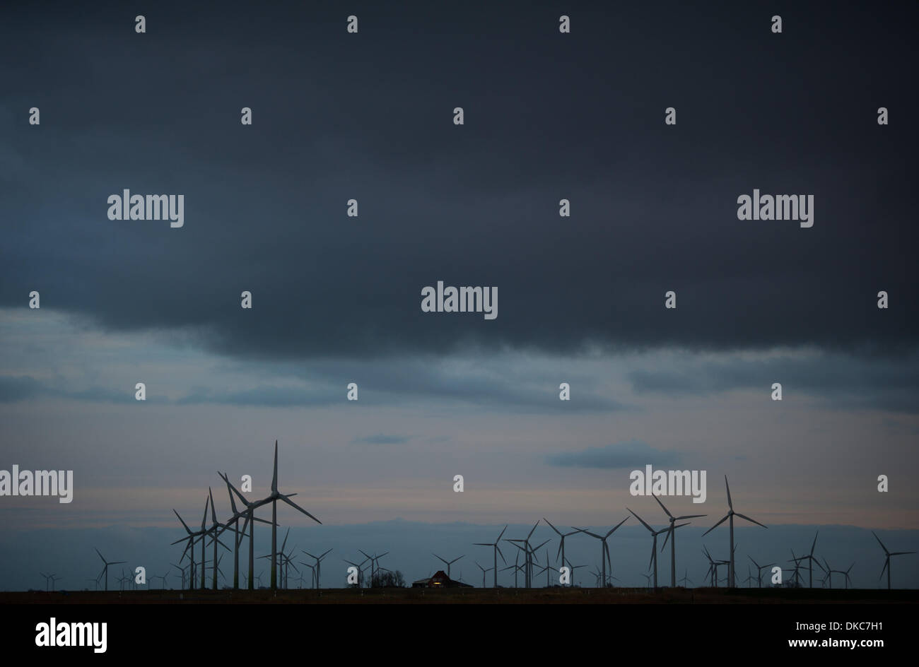 Ockholm, Germany. 04th Dec, 2013. Wind turbines turn during sunset in ...