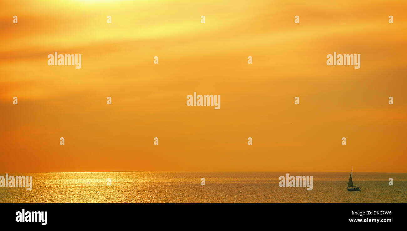 Ship sinking in the golden sunset in the Mediterranean Sea Stock Photo ...