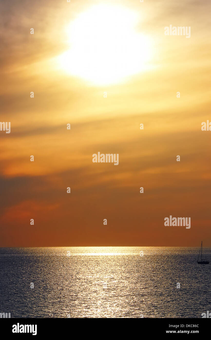 Ship sinking in the sunset in the Mediterranean Sea Stock Photo - Alamy