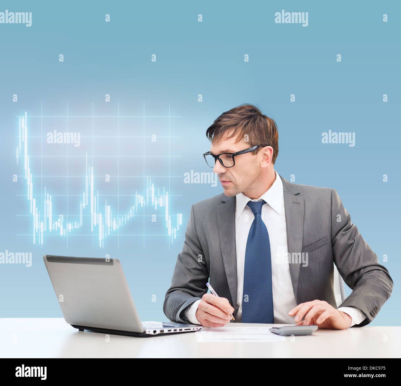 businessman with computer, papers and calculator Stock Photo - Alamy
