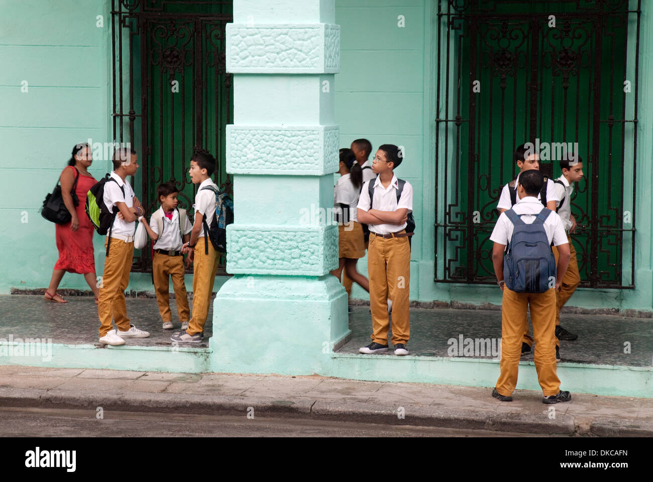 Teenage Cuban schoolchildren, schoolboys, in uniform in the morning ...