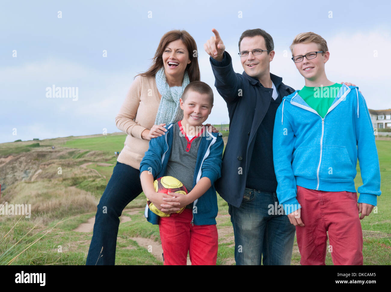 Portrait of family on sand dunes Stock Photo - Alamy