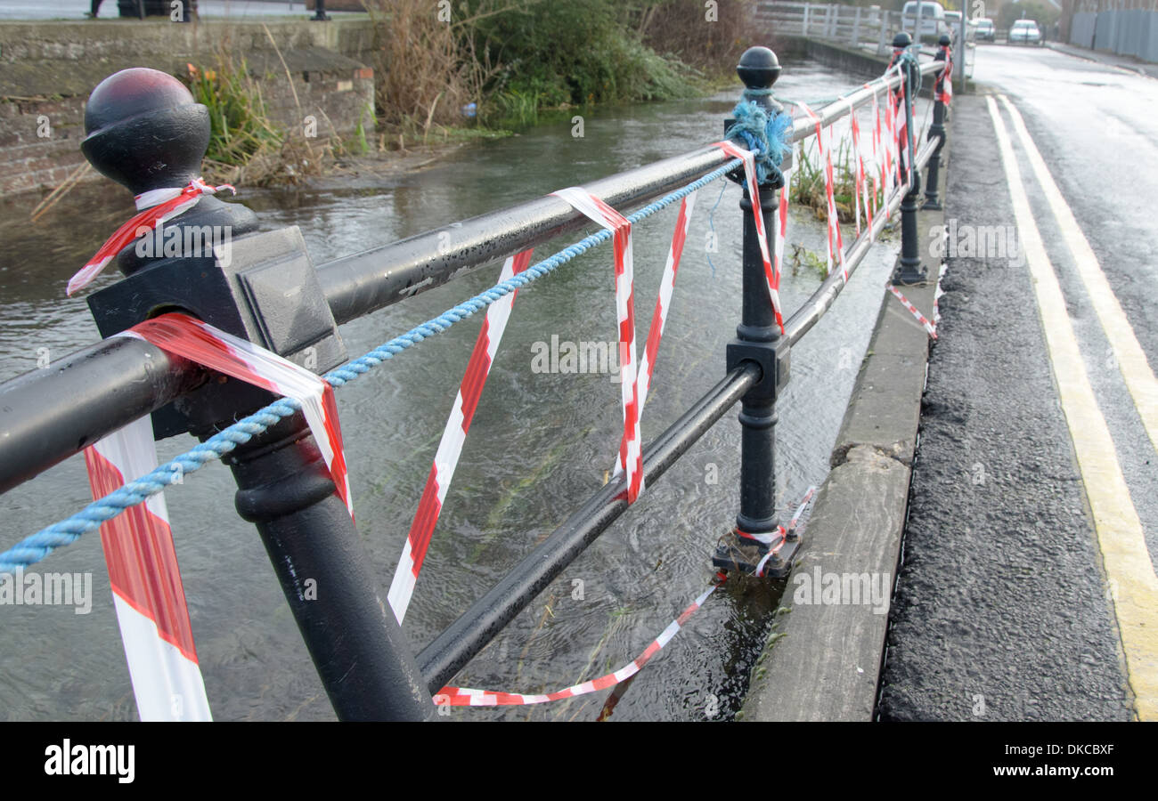 Warning tape for damaged railings Stock Photo - Alamy