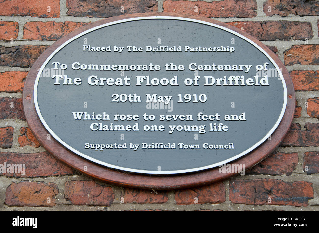 Plaque on wall to commemorate the great flood of Driffield Stock Photo ...