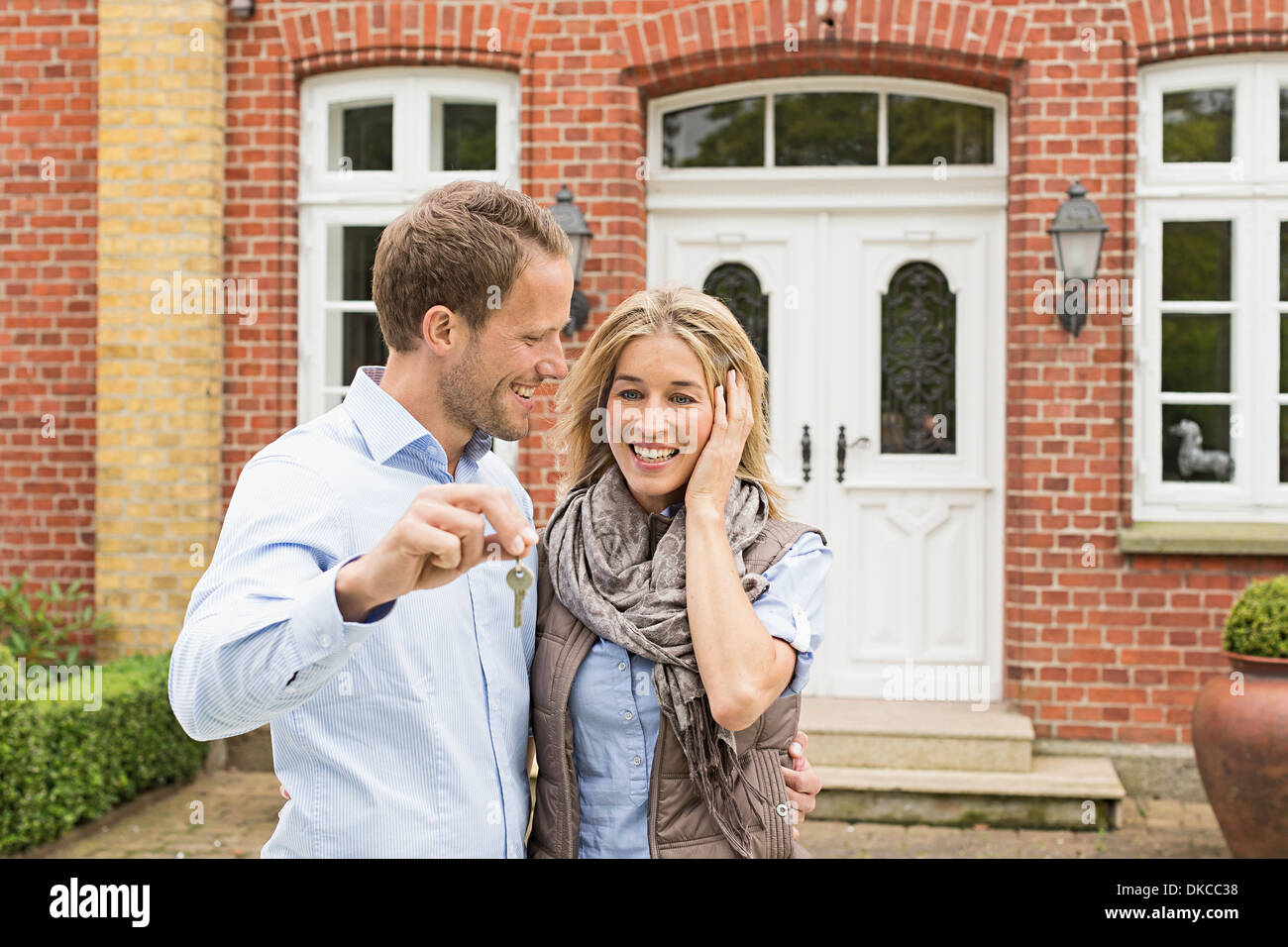 Two hands holding key hi-res stock photography and images - Alamy