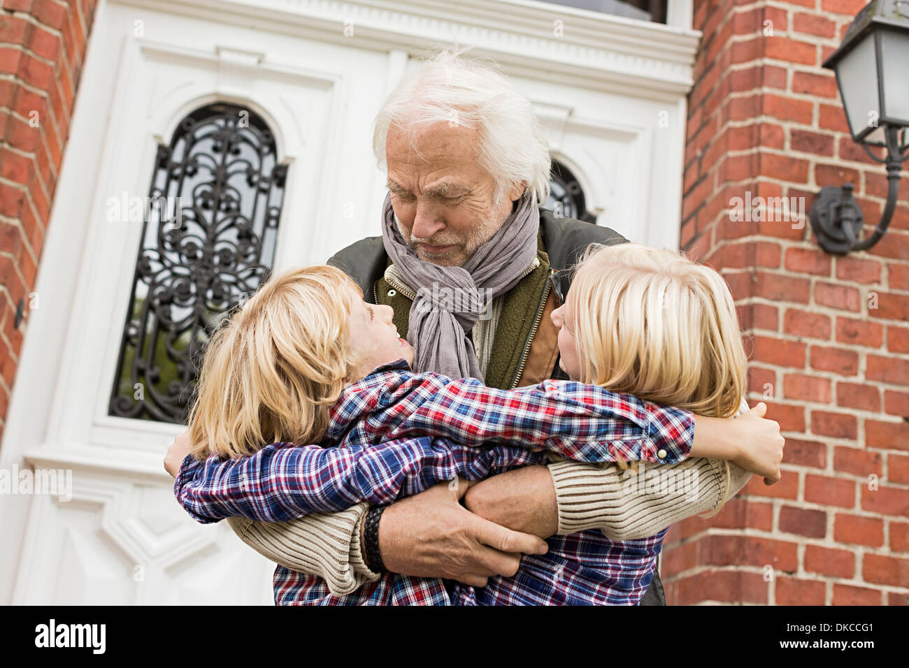 Grandfather hugging grandson hi-res stock photography and images - Alamy