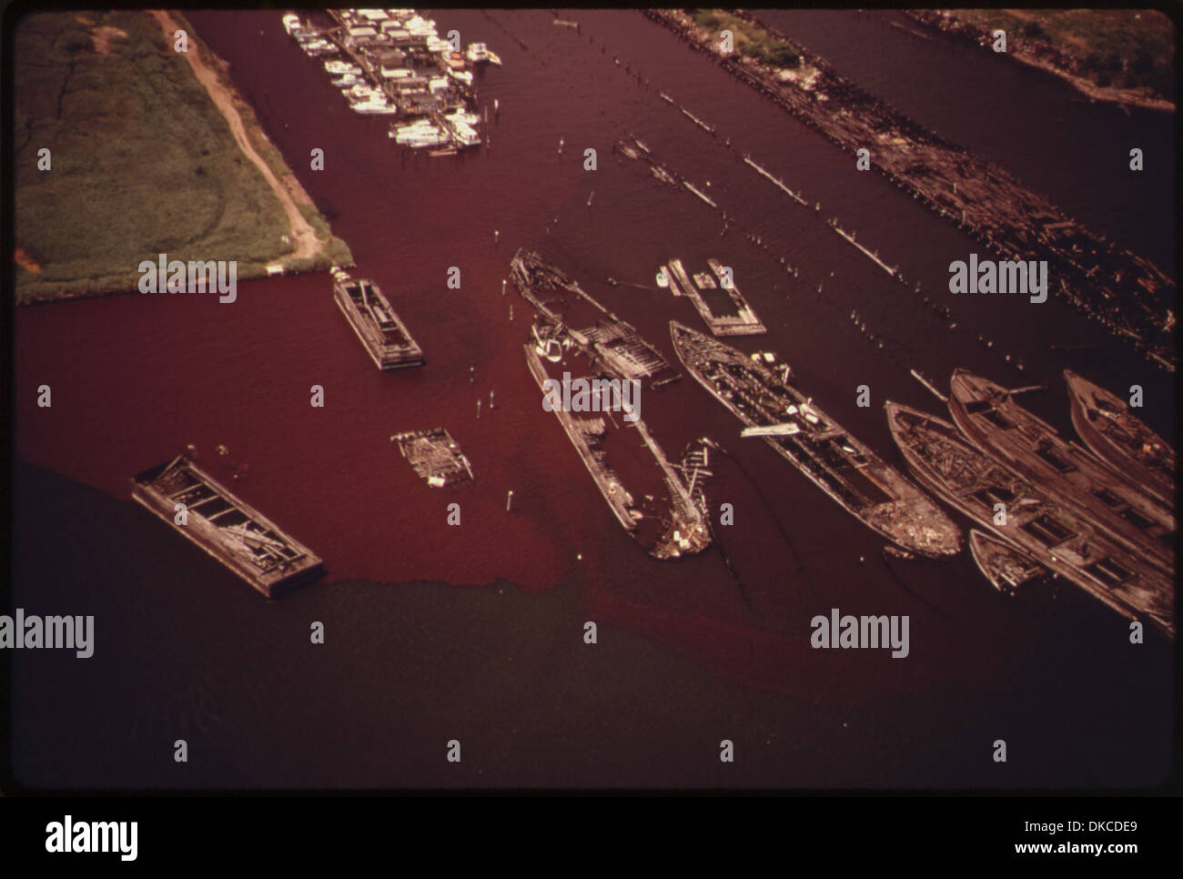 This image depicts industrial contamination in the Arthur Kill River ...