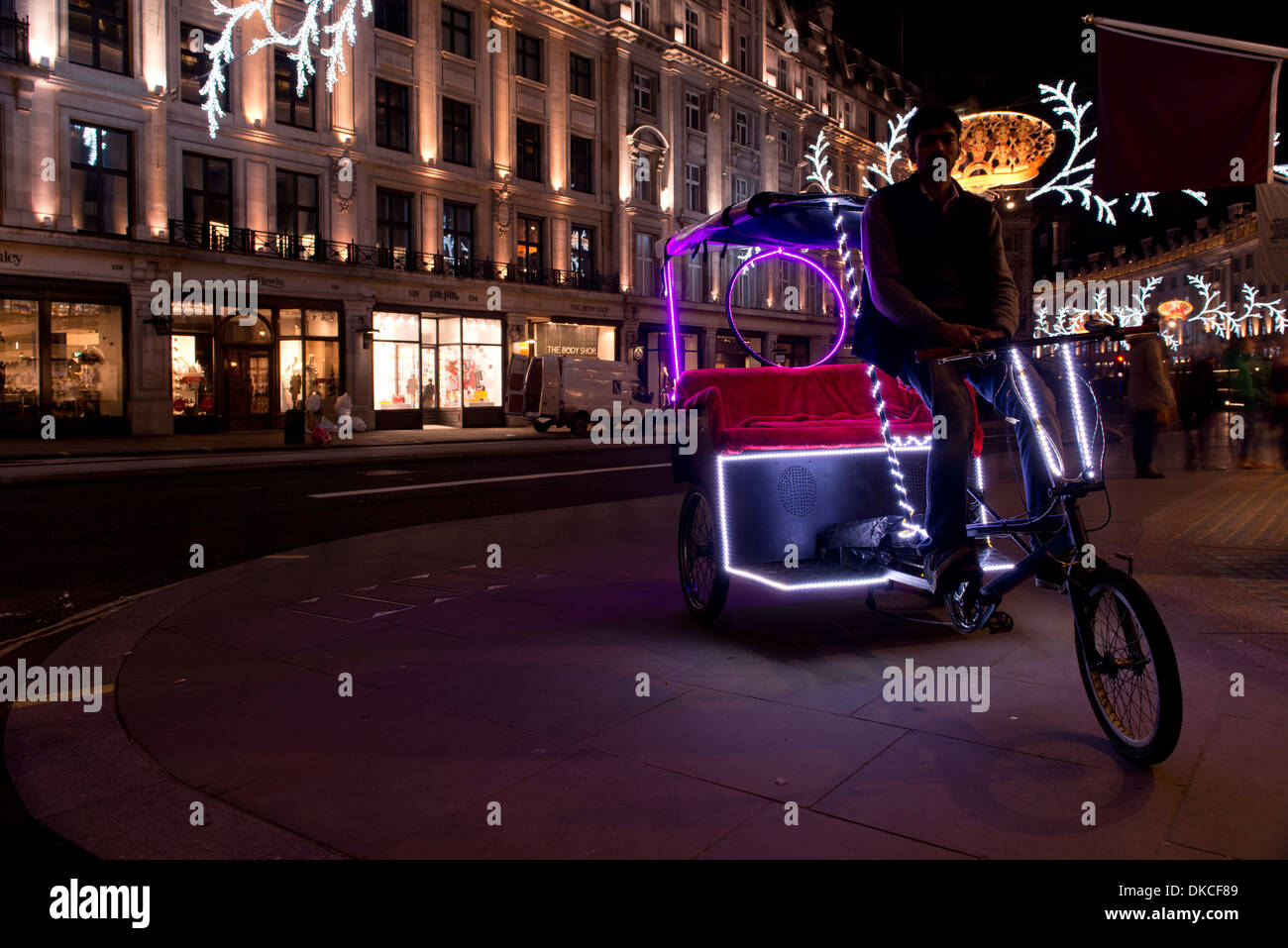 Illuminated bicycle rickshaw in Regents Street Stock Photo - Alamy