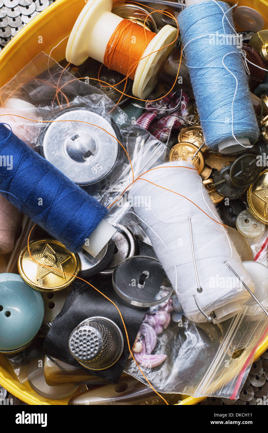 button and sewing tool Stock Photo - Alamy