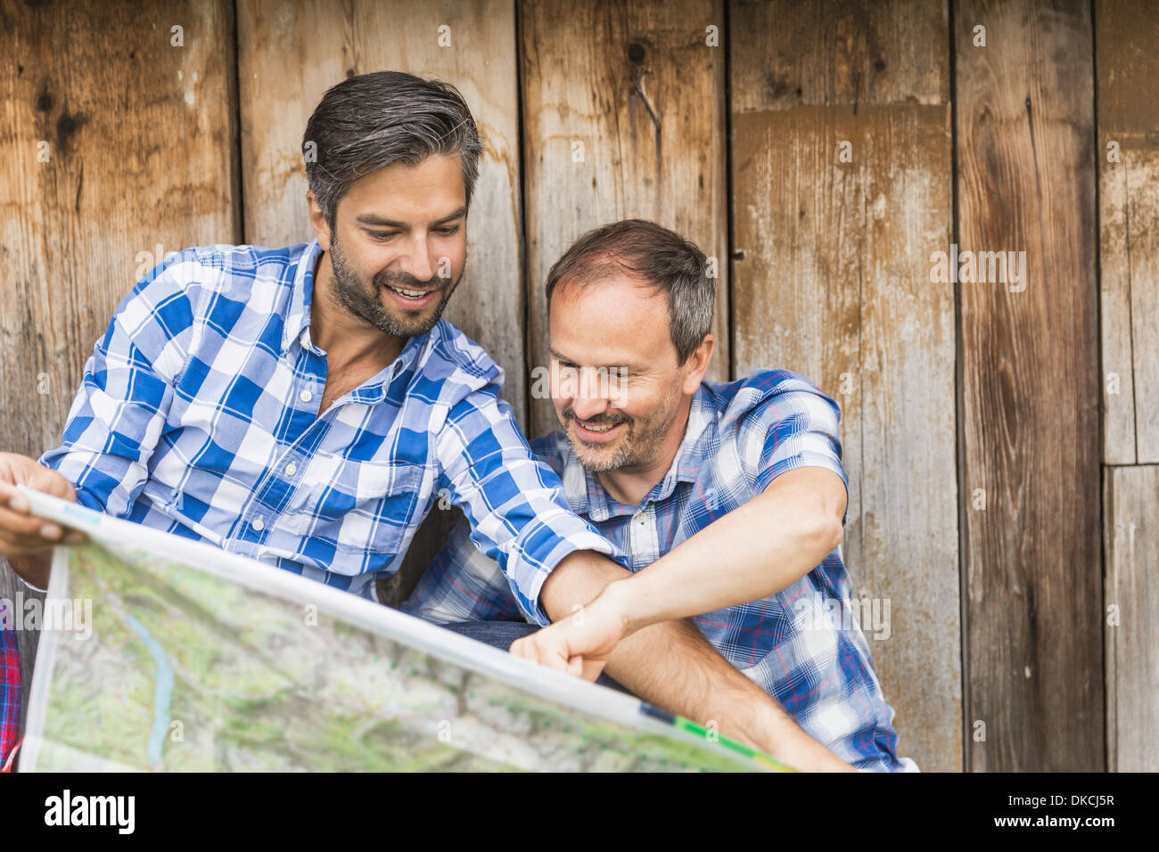Men reading hi-res stock photography and images - Alamy