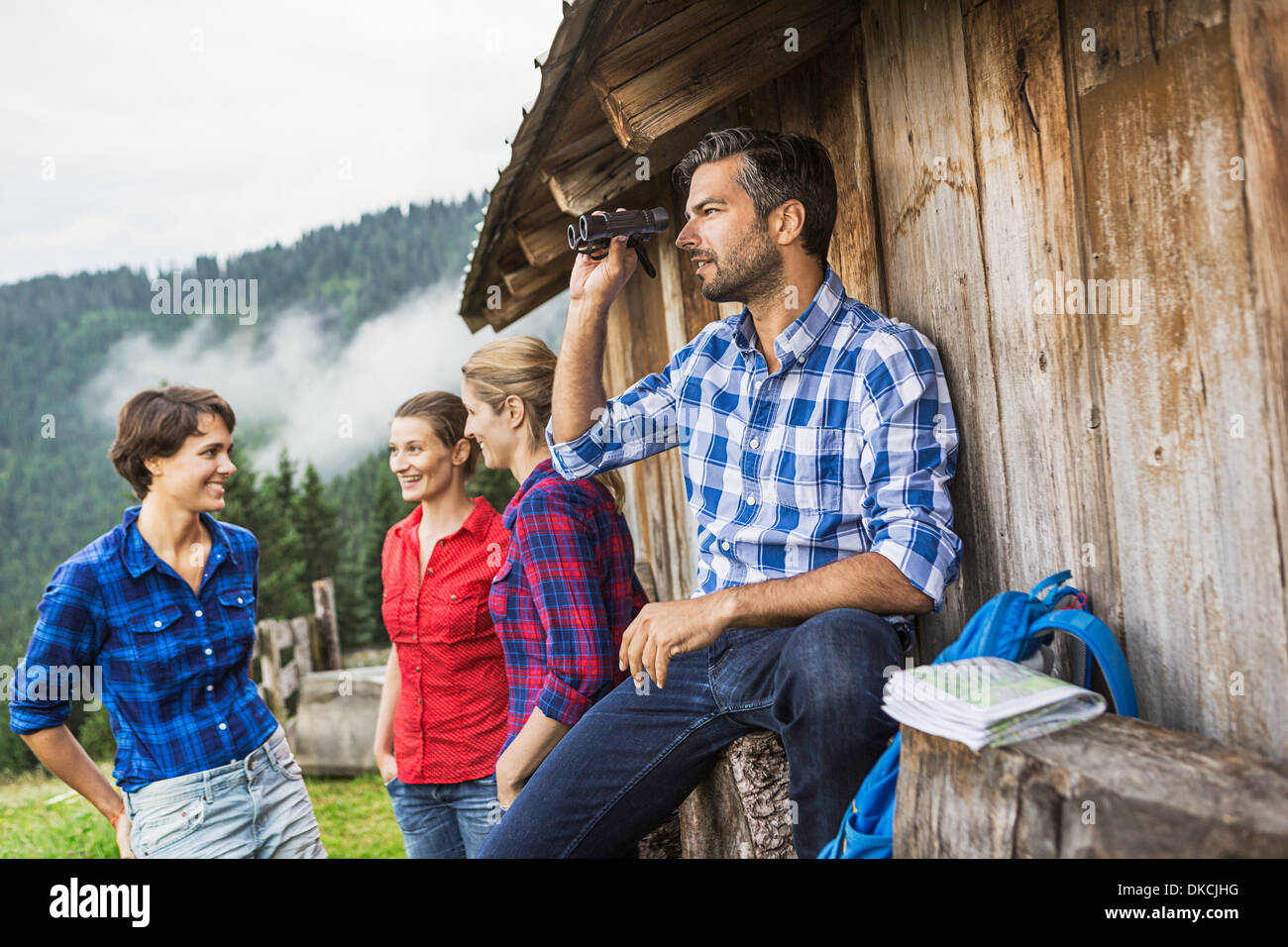 Group people looking through binoculars hi-res stock photography and ...
