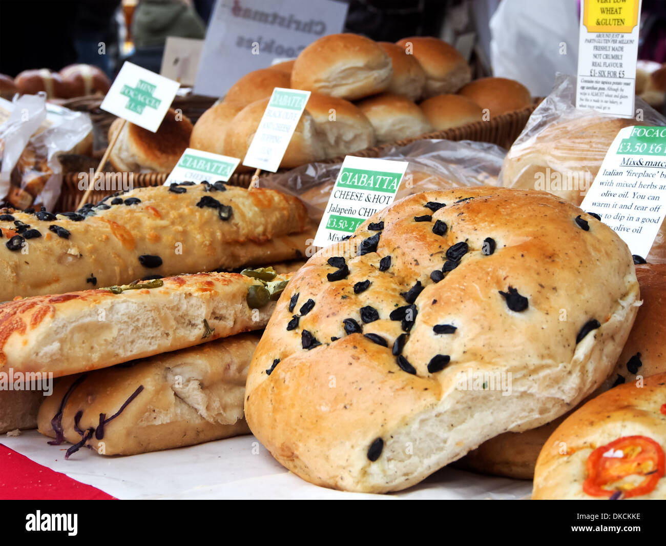 Various types of bread for sale on a market stall Stock Photo - Alamy