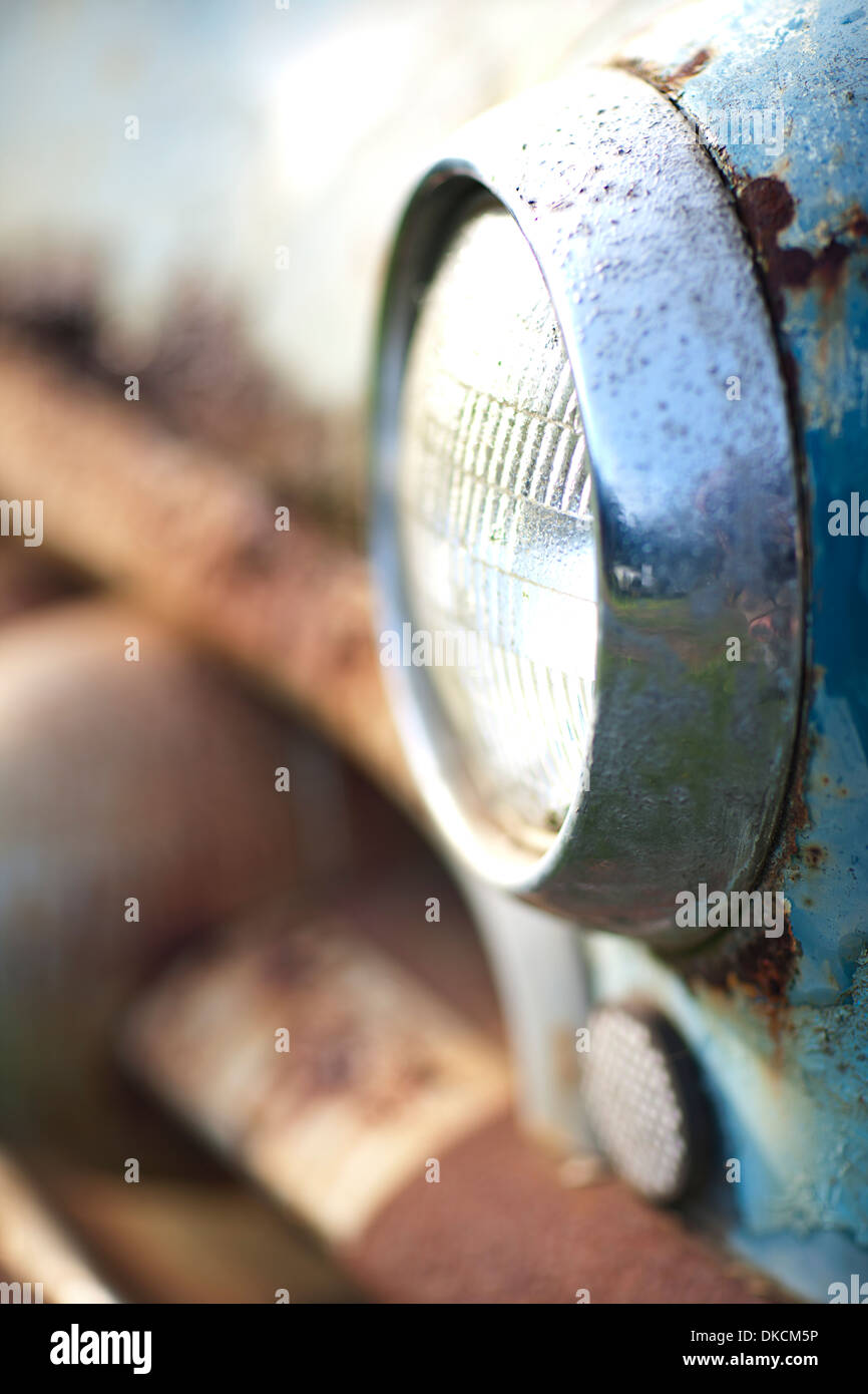 Side view of rusty car headlight and bumper Stock Photo - Alamy