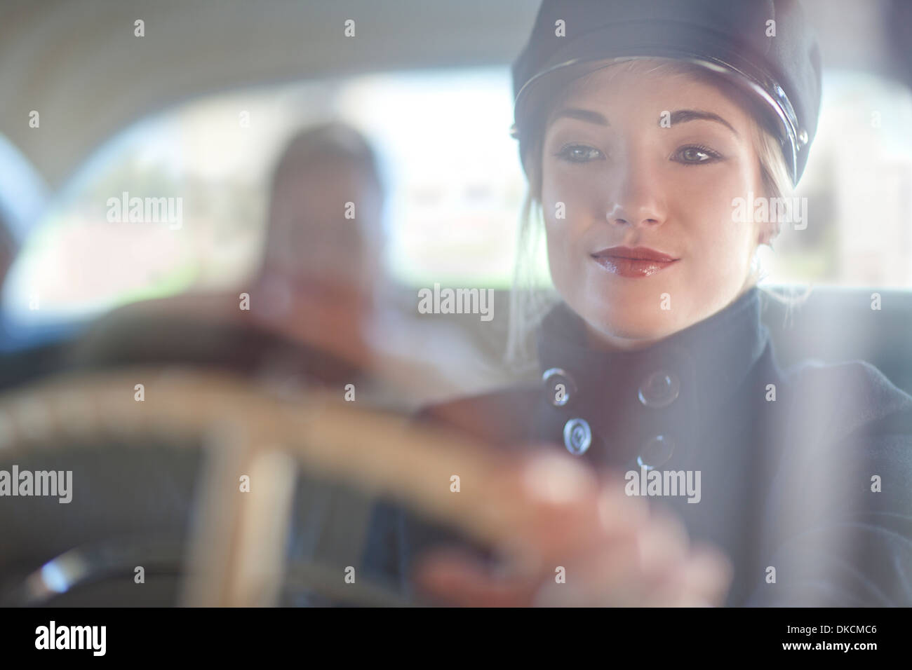 Woman chauffeur hat hi-res stock photography and images - Alamy