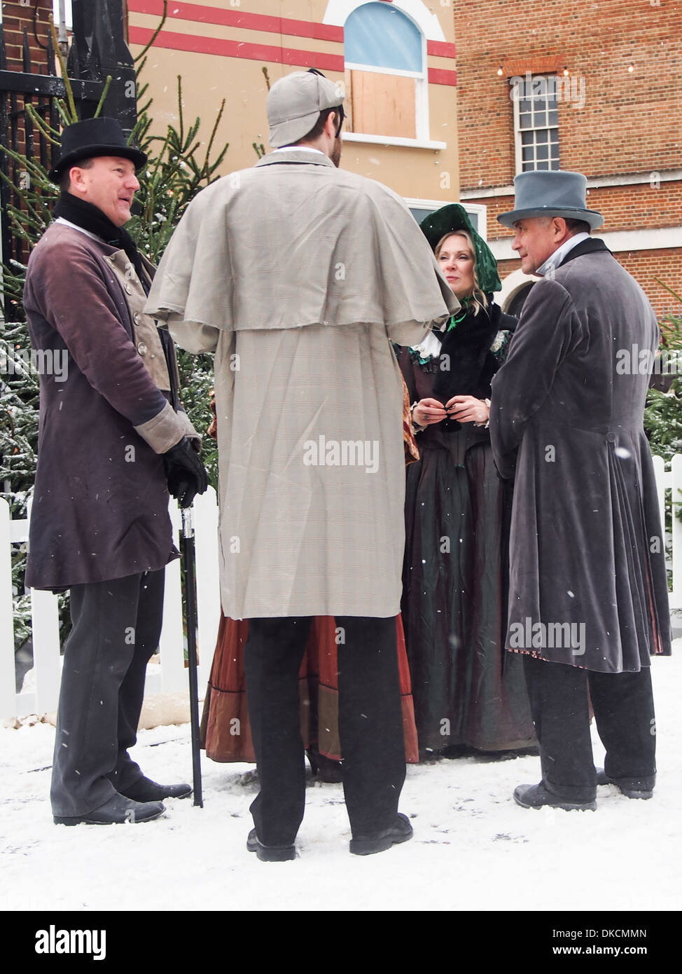Actors in Victorian costumes standing in snow Stock Photo - Alamy
