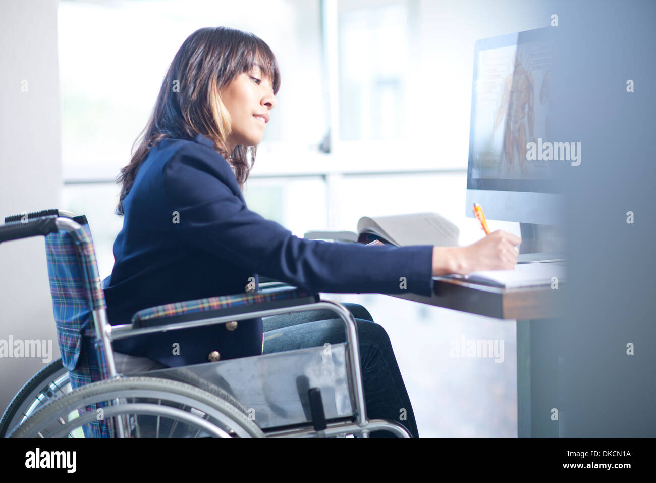 Woman writing down notes hi-res stock photography and images - Alamy