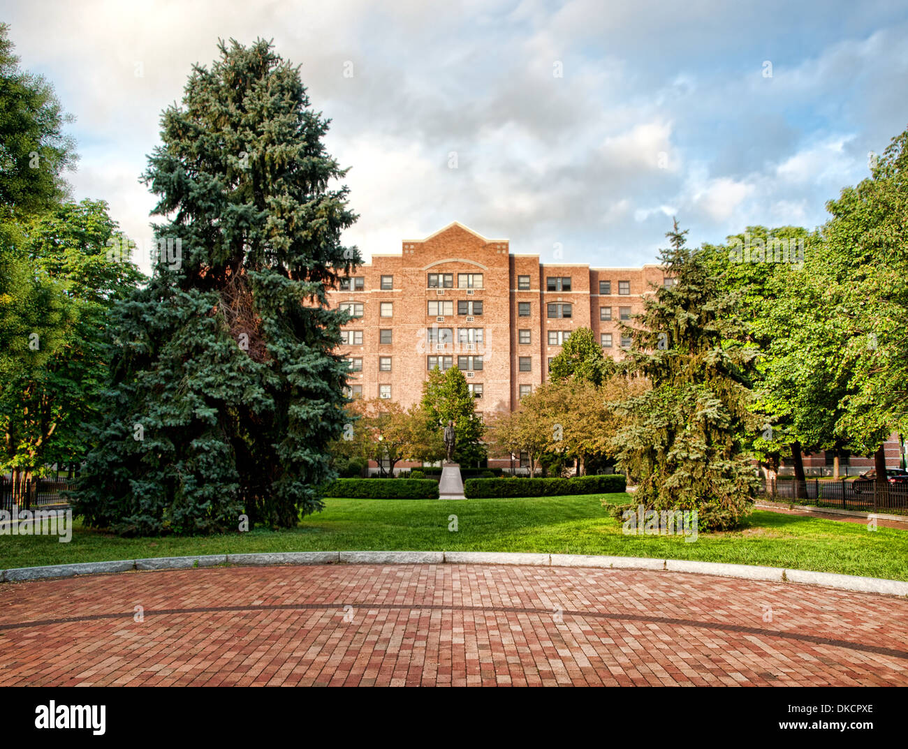 apartment building with small park Stock Photo - Alamy