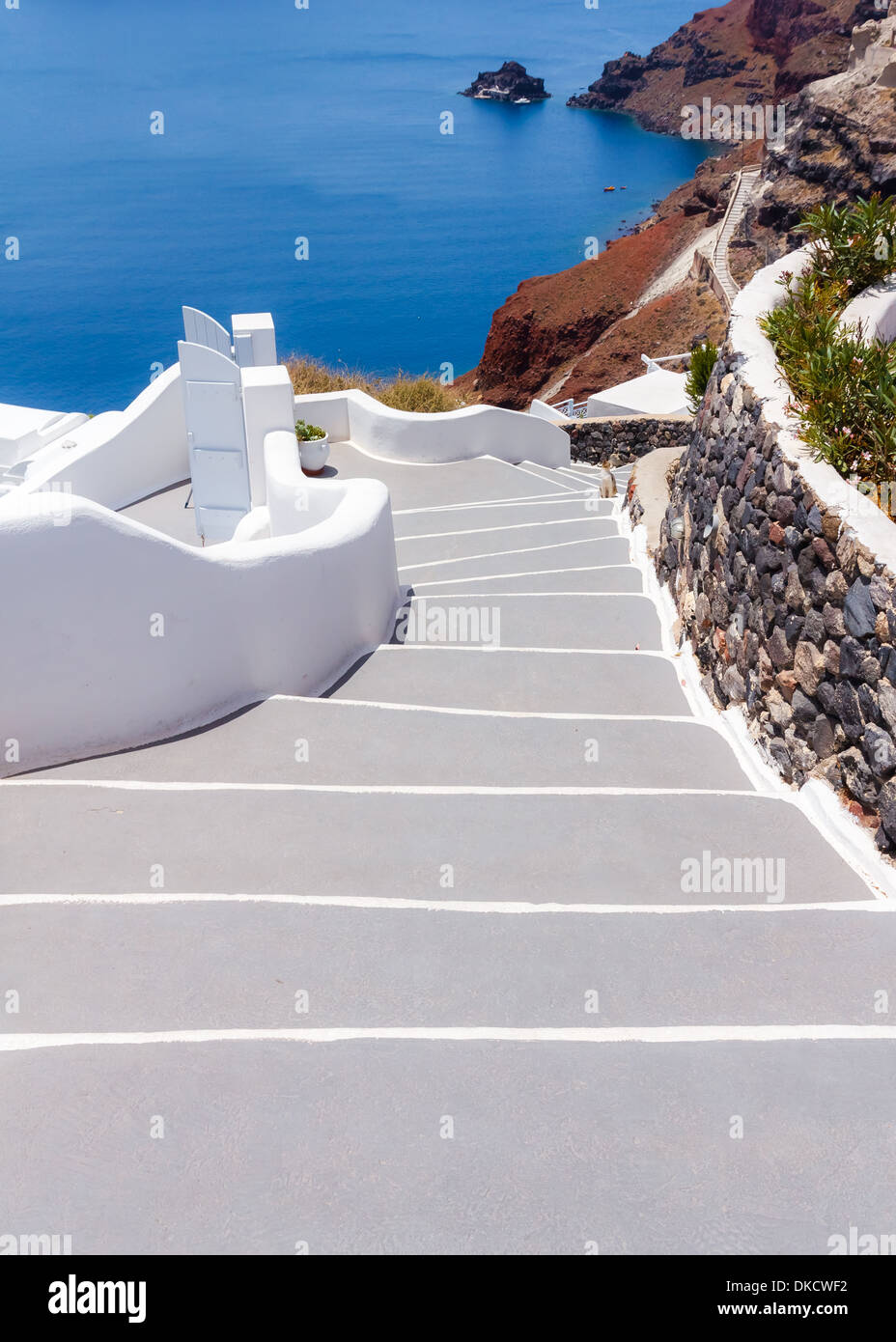 Steps descending the hill to the sea from Oia in Santorini, Greece ...