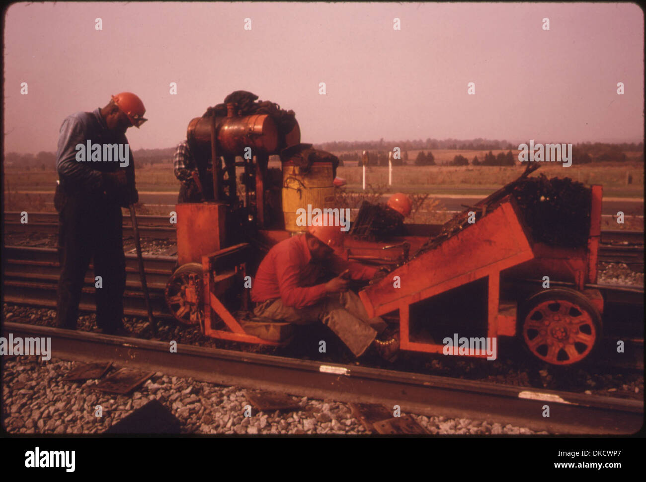 Southern Railway workers use specialized machinery to replace old ...