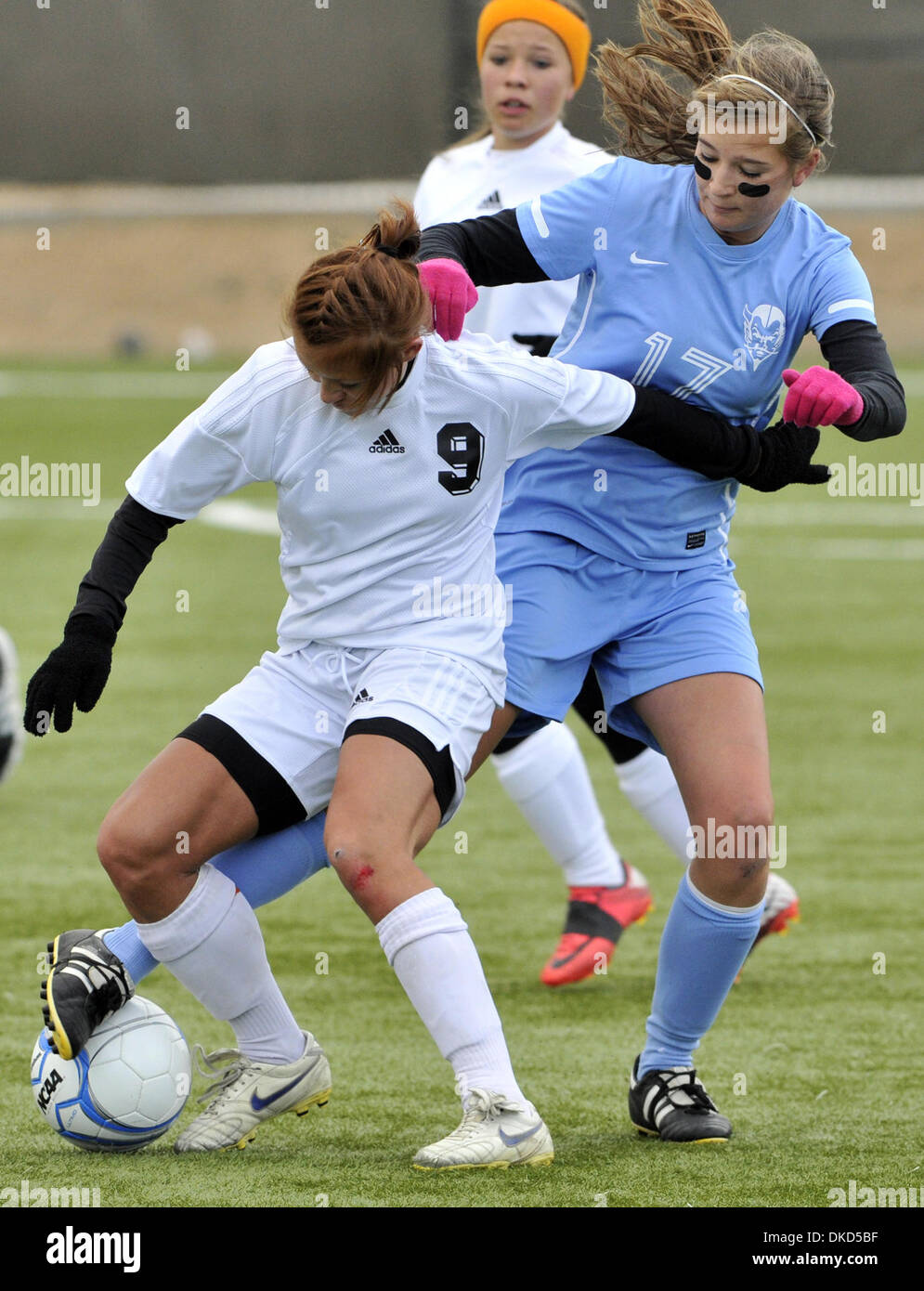 Nov. 5, 2011 - Albuquerque, NM, U.S. - Greg Sorber -- Sandia Prep's Natalie Reid, 17, gets a ...