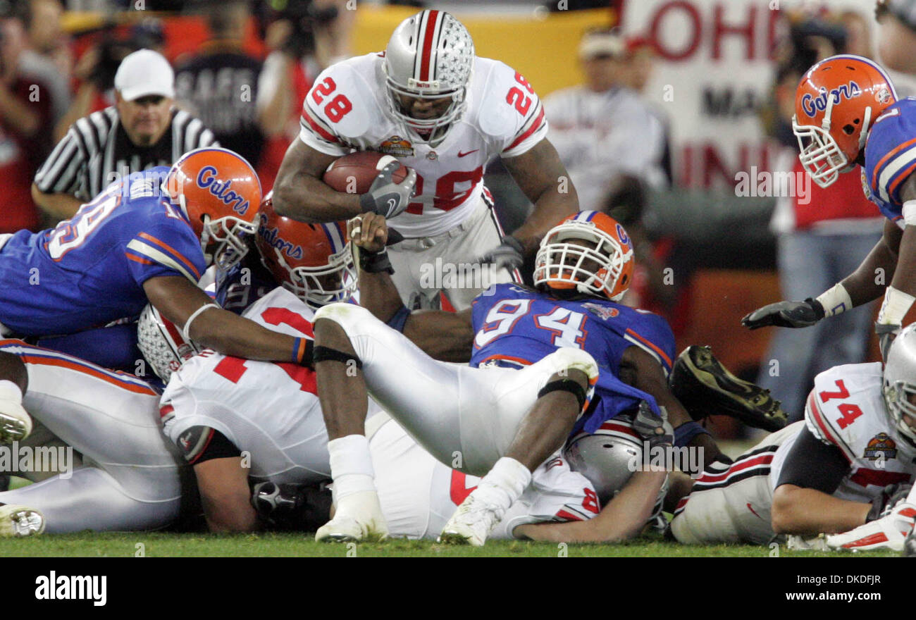 Jan 08, 2007; Glendale, AR, USA; OSU RB #28 CHRIS WELLS is stopped on ...