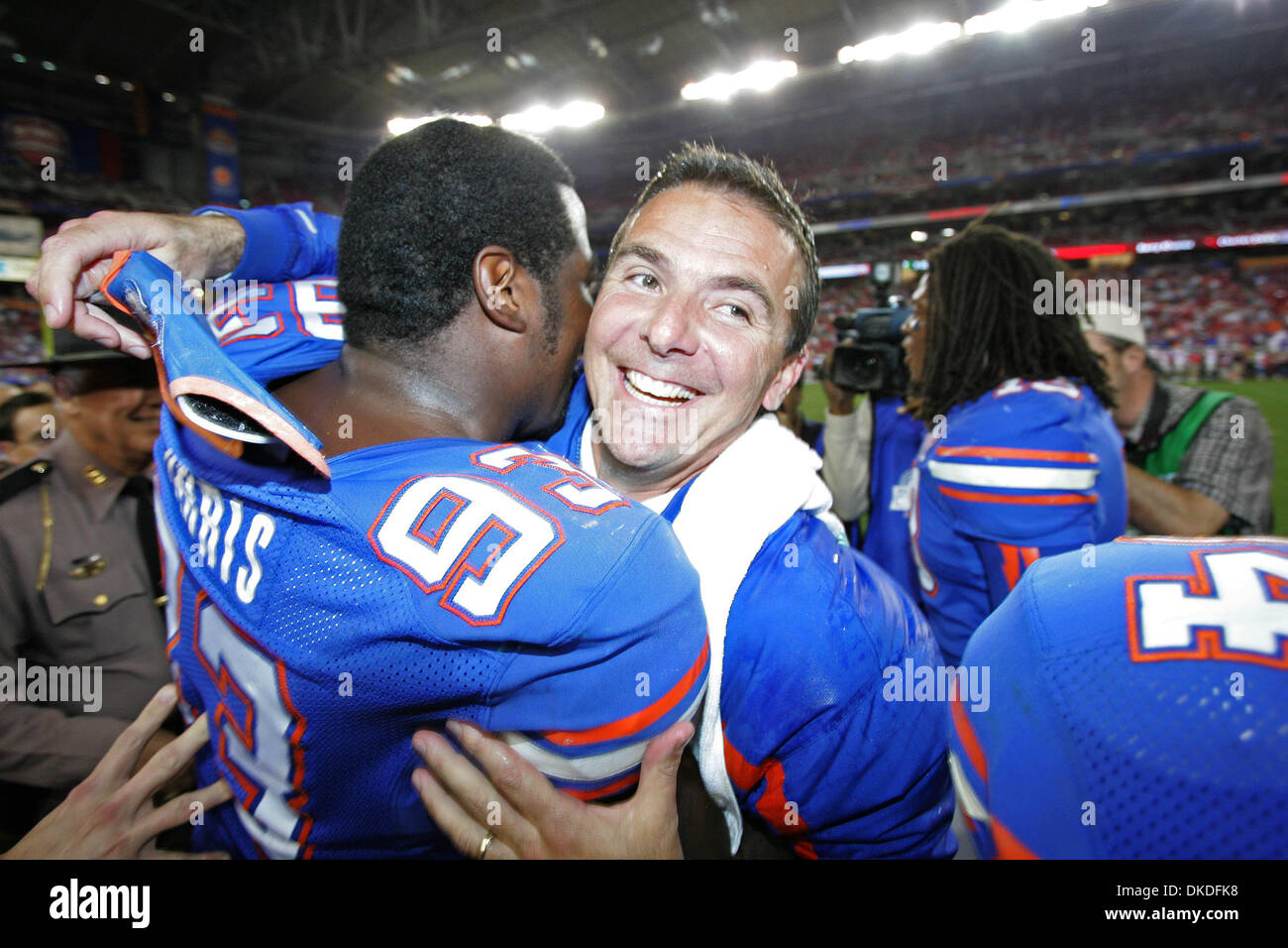 Jan 08, 2007; Glendale, AR, USA; Coach URBAN MEYER gets a hug from UF's ...
