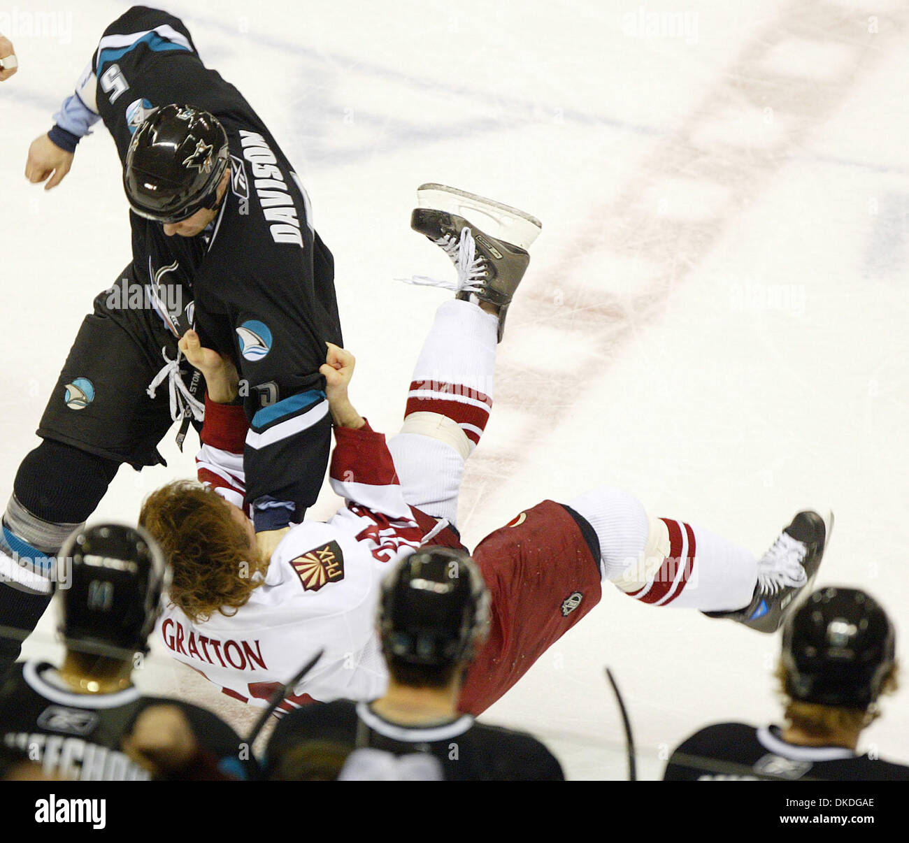 The Sharks ROB DAVISON takes down the Coyotes JOSH GRATTON during a ...