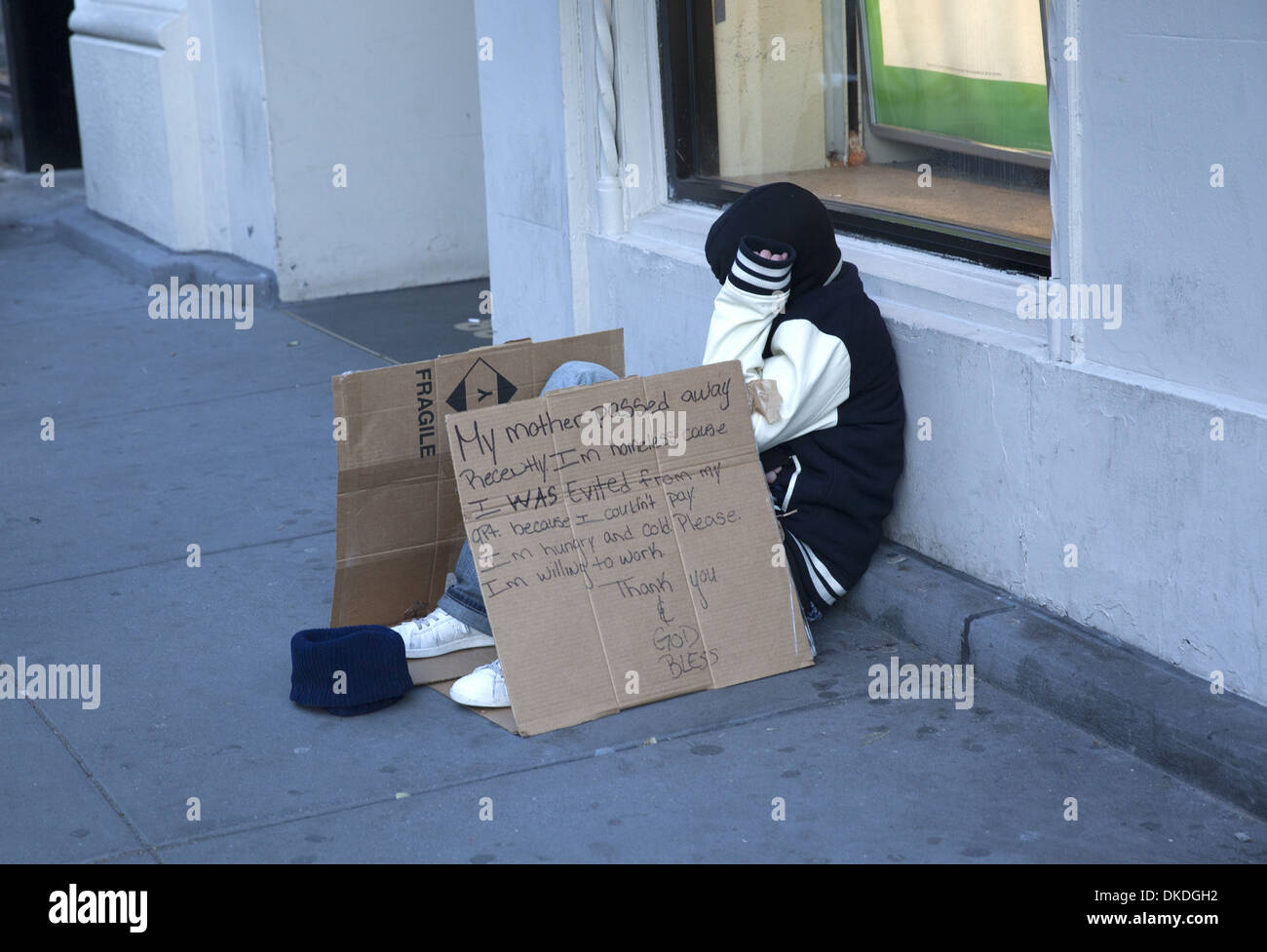 Young homeless man reaching out for help on the sidewalk near Union ...