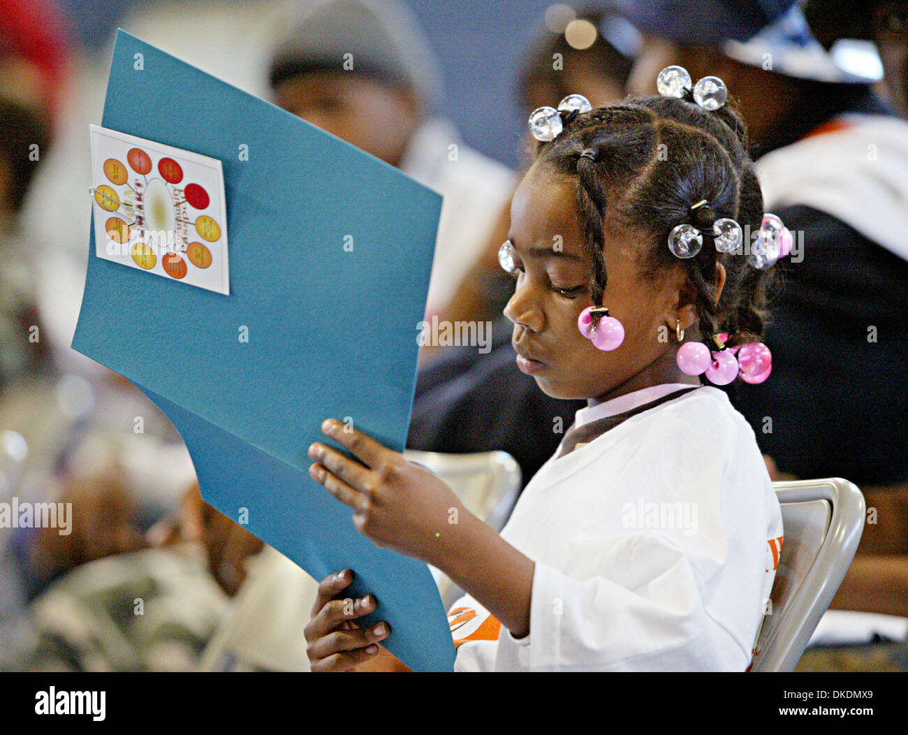 Camryn Williams,8,came to the Youth Summit in East Palo Alto Saturday ...