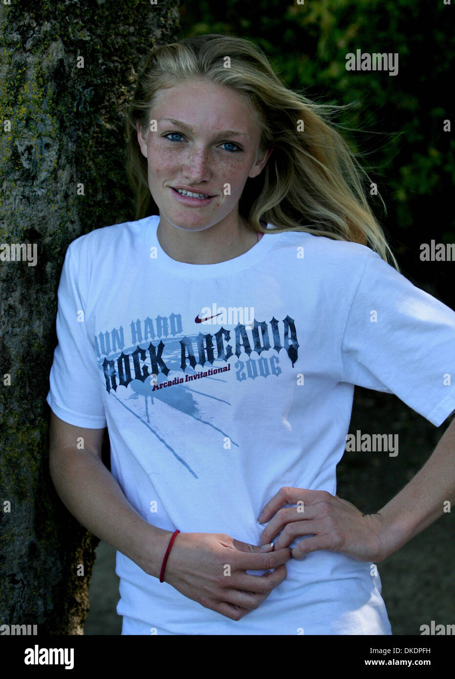 Mary Rhoades, a member of the Carlmont High School track team, is the ...