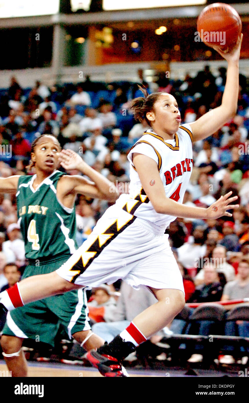 Berkeley's Dominique Williams-McNac drives by Long Beach Poly's ...
