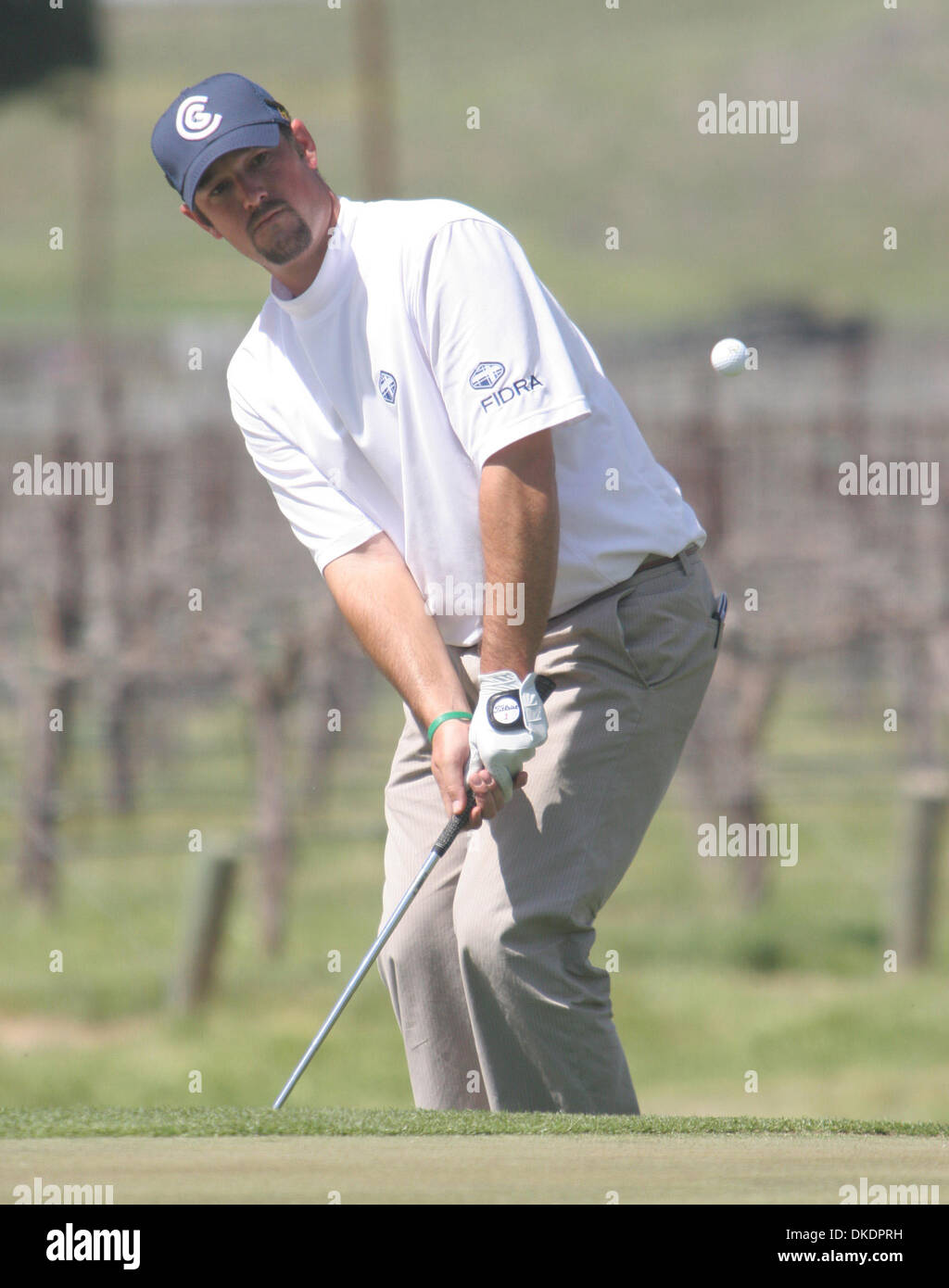 Josh Williams chips onto the 18th green at The Course at Wente ...