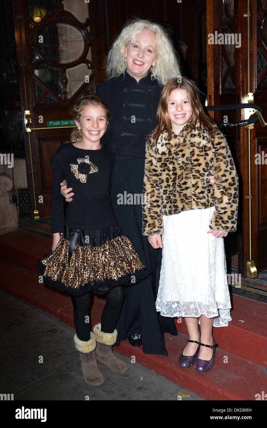 London, UK. 4th December 2013. Debbie Price and her daughter's arrive ...