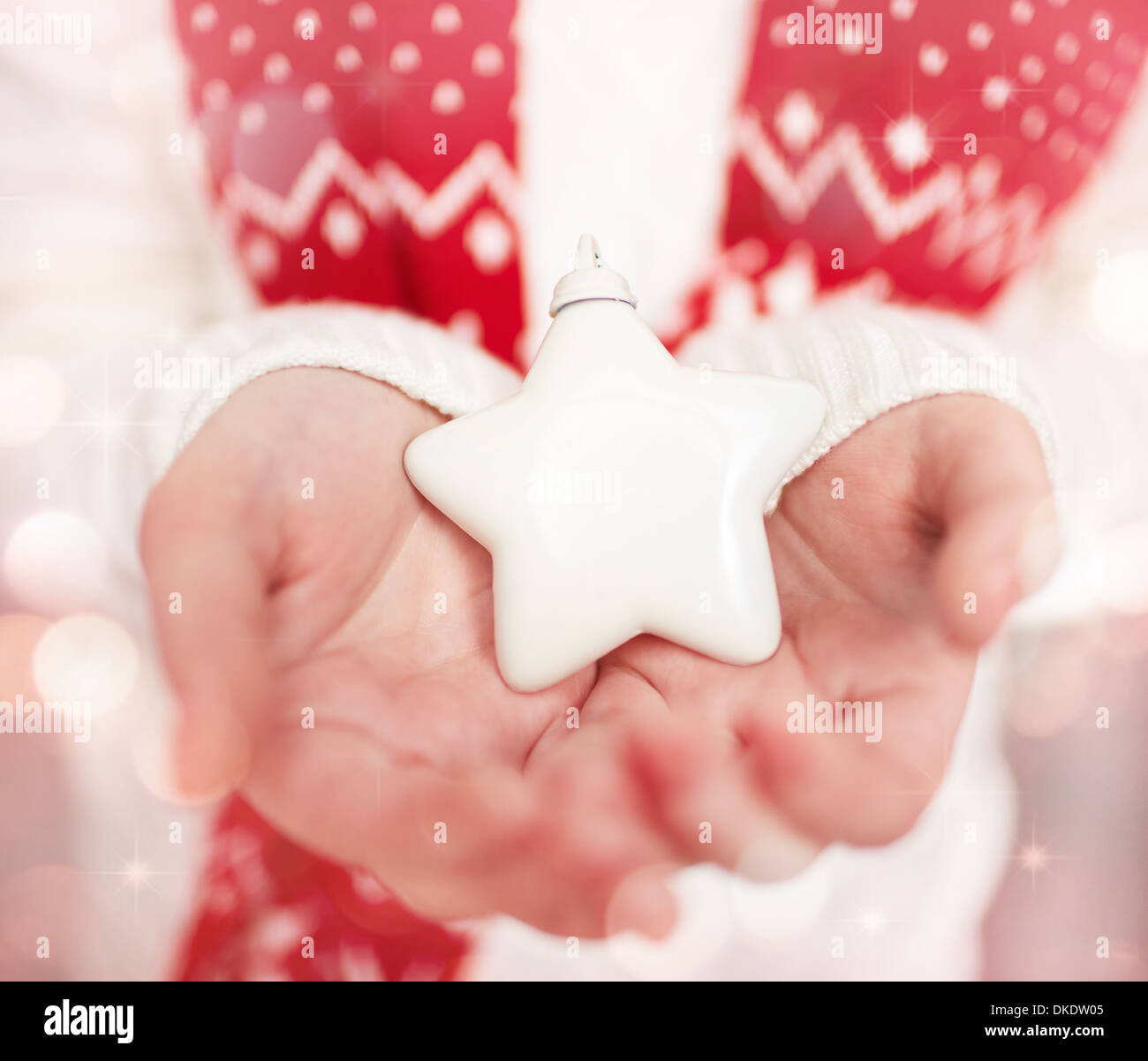 Image of decorative toy star on female hands Stock Photo - Alamy