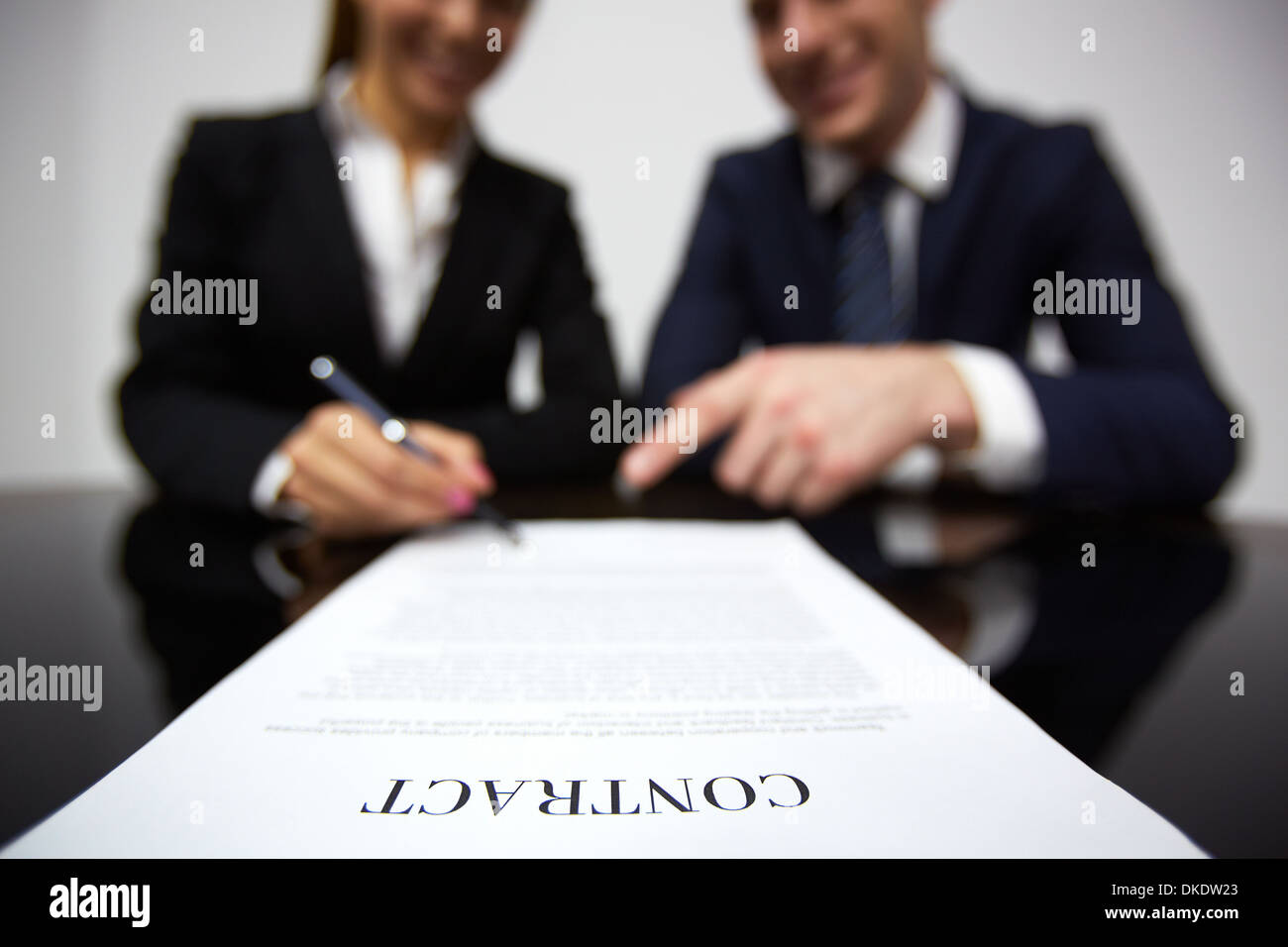 Image of human hands during signing contract Stock Photo - Alamy
