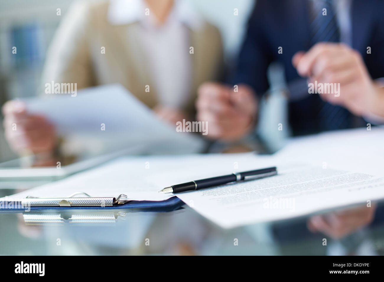 Business documents and pen at workplace Stock Photo - Alamy