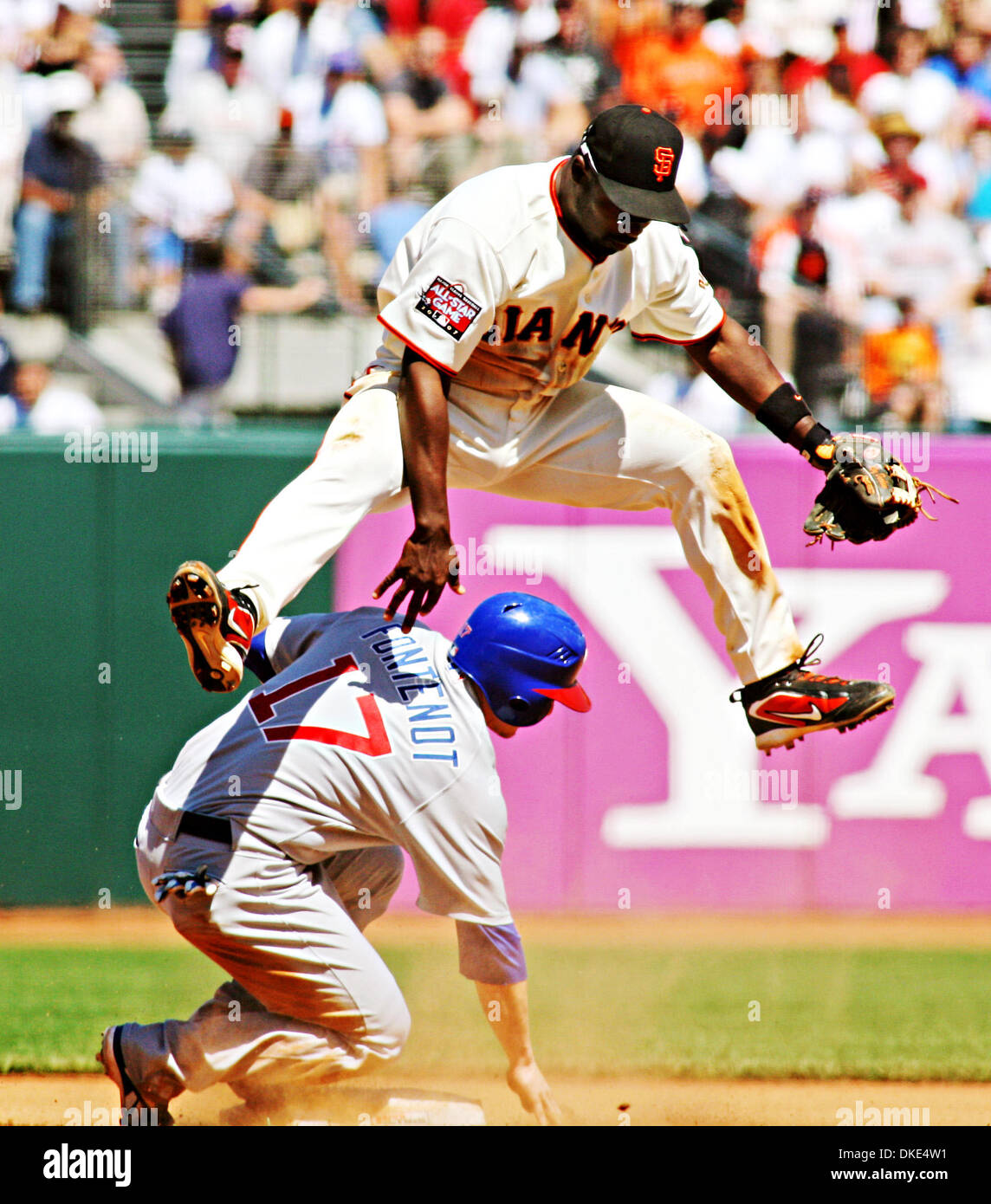 San Francisco Giants second baseman Ray Durham leaps over Cubs' Mike ...