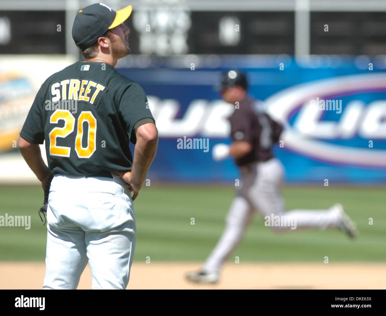 (L-R) A's pitcher Huston Street looks away as Matt Stairs of the ...