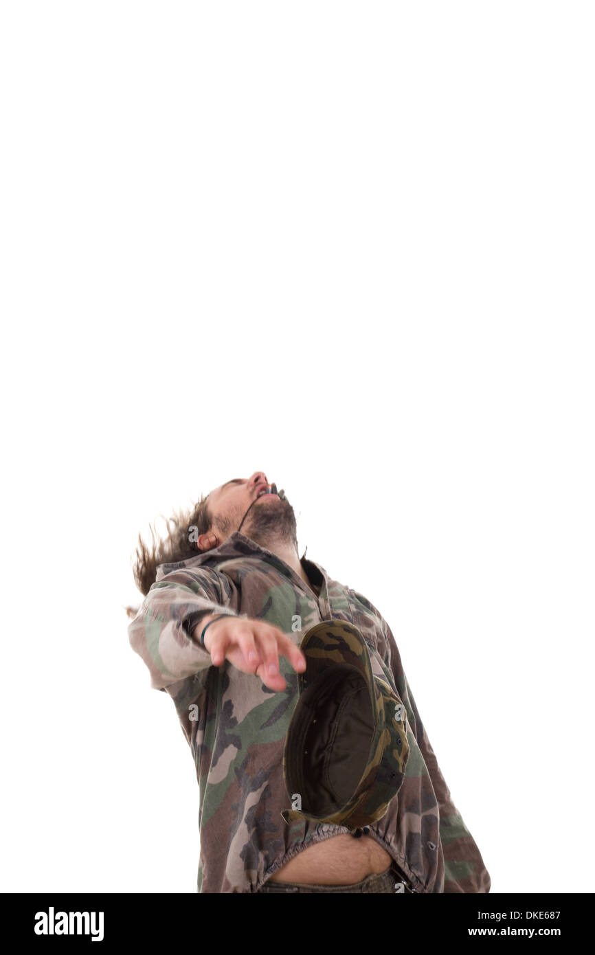 soldier in military uniform falls down in battle Stock Photo - Alamy