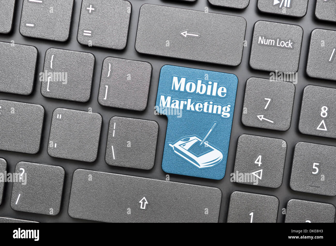 Mobile marketing on keyboard Stock Photo - Alamy