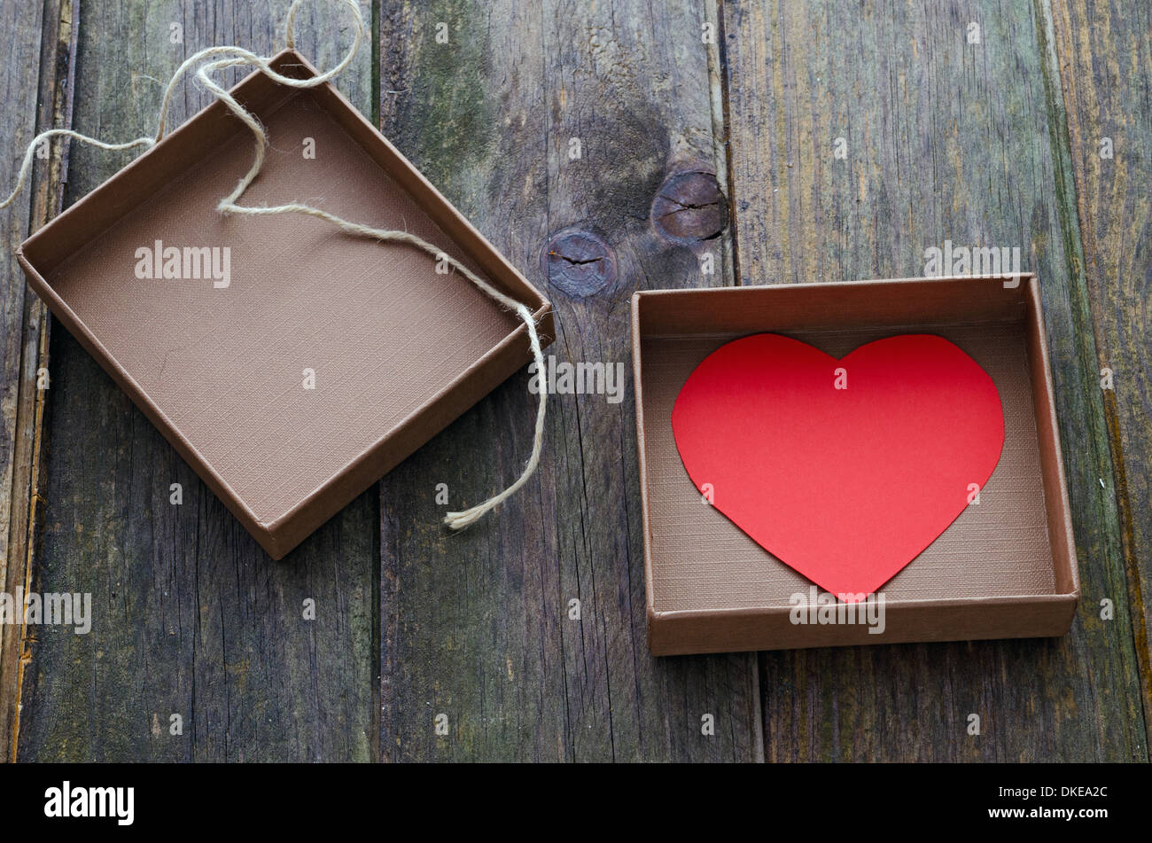brown cardboard box with a red heart inside Stock Photo - Alamy