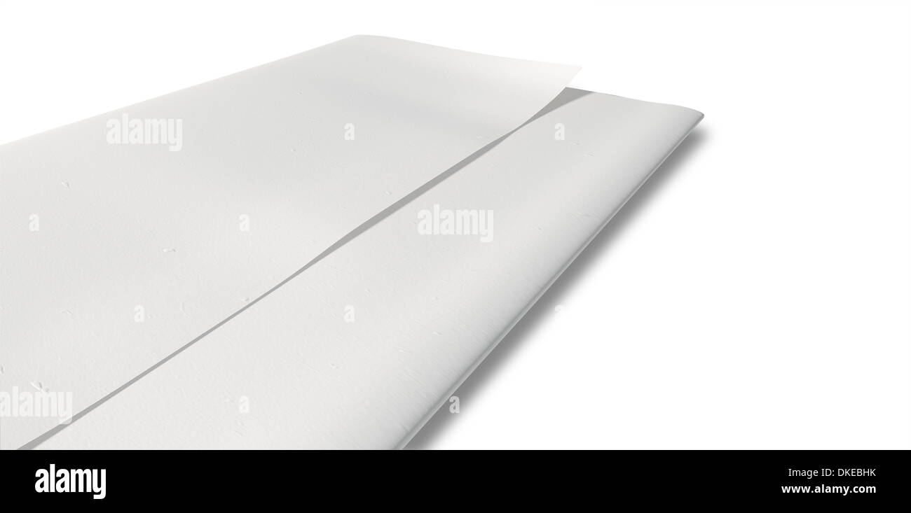 A piece of white paper folded up three times to make a DL sized letter ...