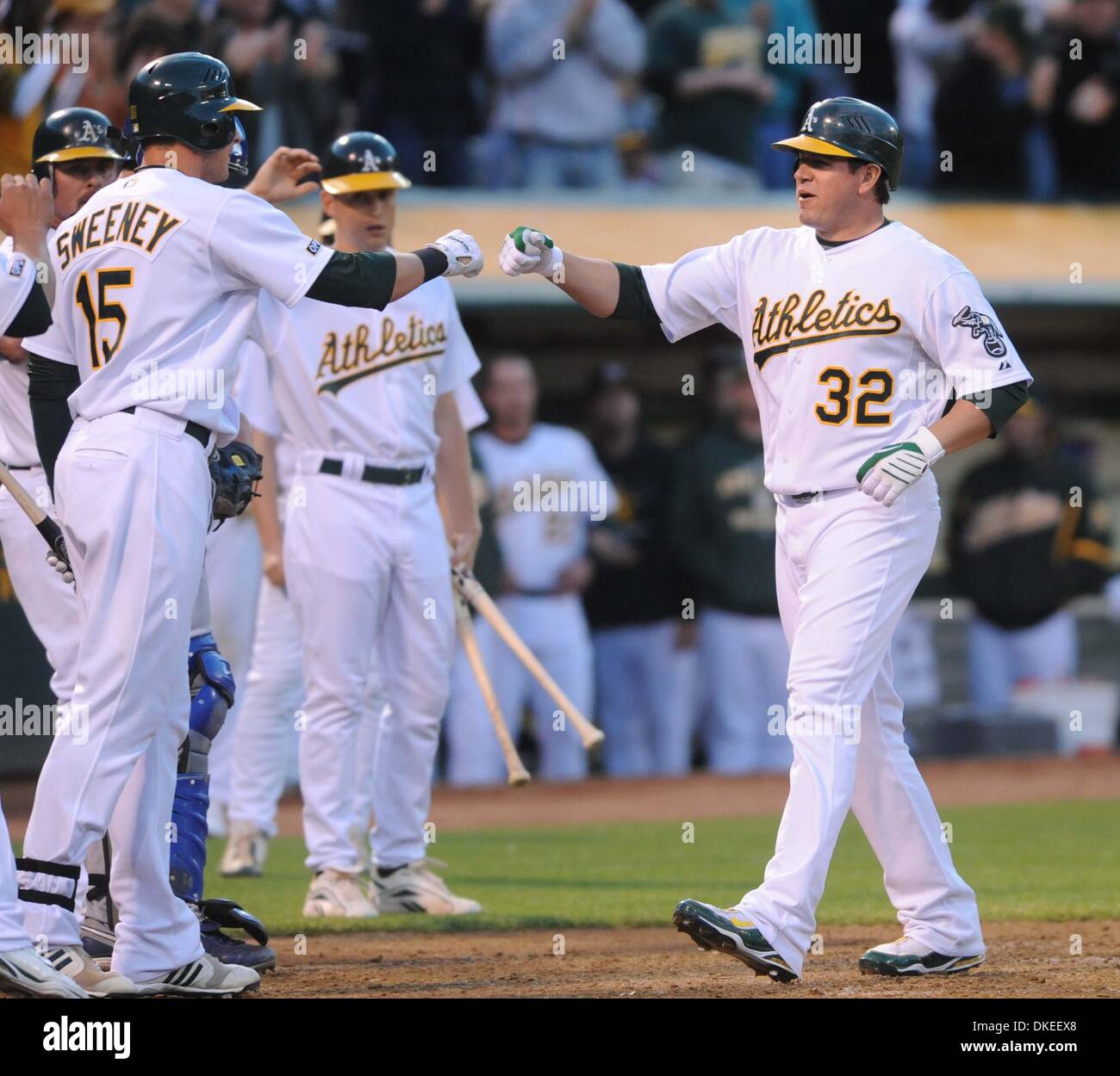 Oakland Athletics #32 Jack Cust, right, celebrates with teammates after ...