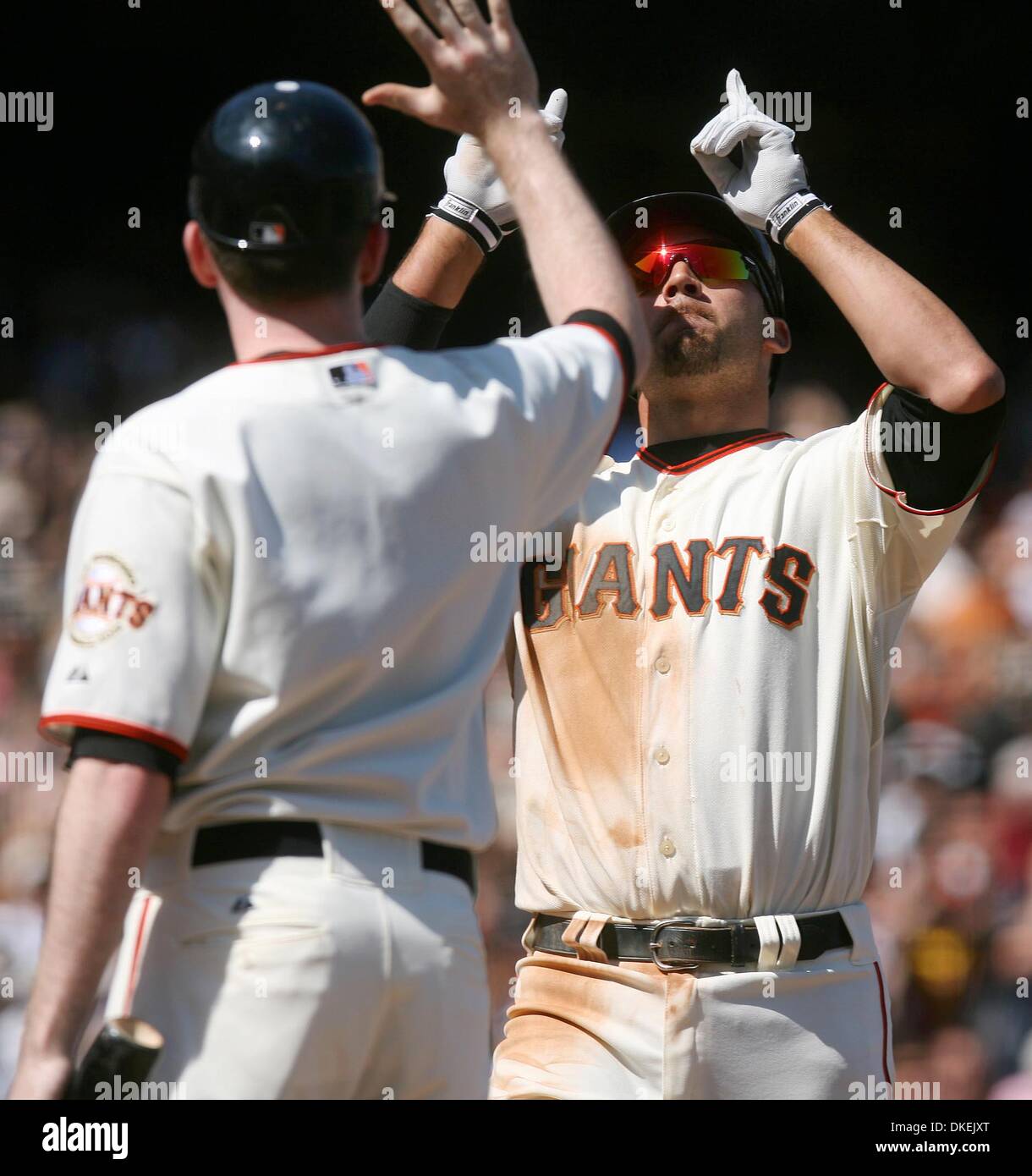Travis Ishikawa celebrates at the plate after hitting a three-run homer ...